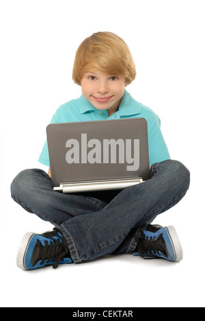 Child using technology. 5 year old boy with a smart phone or iPhone ...