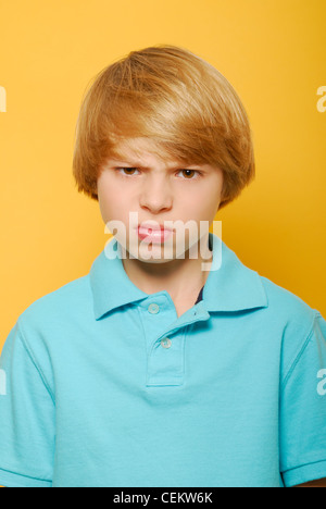 boy mad angry pout blond long hair sad worry worried concern upset blue ...