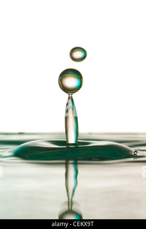 splash of the falling drops of water, collision drops Stock Photo - Alamy