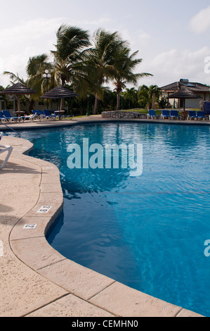 gorgeous swimming pool with fountain on a tropical resort (caribbean ...