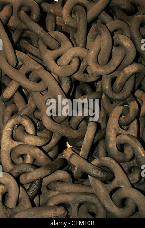 Rusty Chain Links. A pile of large rusting chain links that once formed ...