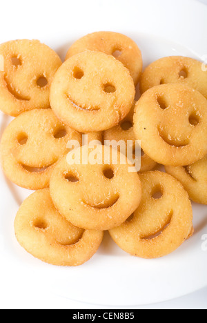 Delicious potato chips smile shape isolated on white Stock Photo - Alamy