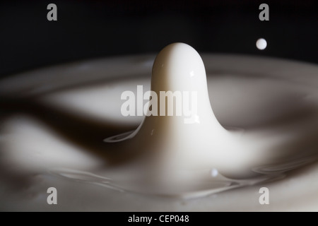 Shapes created by drops of milk and milk splashes Stock Photo - Alamy