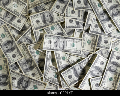 Many dollar bills scattered on a wooden floor Stock Photo - Alamy
