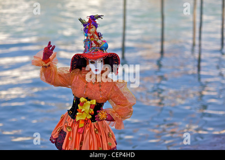 Revellers in mask and costume at the Venice carnival, in St Mark's ...