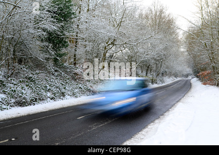 A commuter driving in a winter snow storm Stock Photo - Alamy