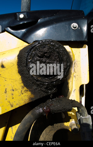 The yellow front-end loader is a heavy-duty construction machine used ...