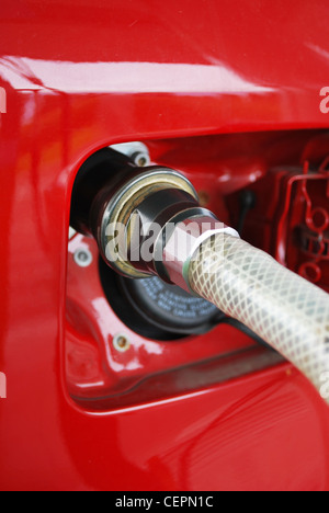 Ecologic methane red car fueling detail Stock Photo - Alamy
