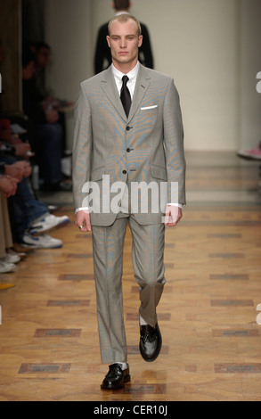 Jasper Conran Milan Menswear S S Male model wearing white suit and red ...