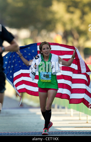 Female Runner Winning Marathon Stock Photo - Alamy