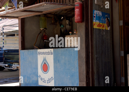 A small gas station that serves residents by hand pump is part of the ...