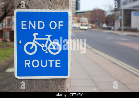 british end of cycle route road sign beneath a 30mph speed limit sign ...