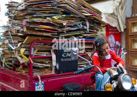 Picture of a three wheeler used to collect paper and carton by the ...