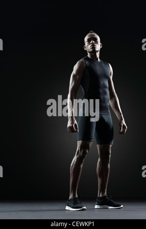 Full length portrait of a male athlete running Stock Photo - Alamy