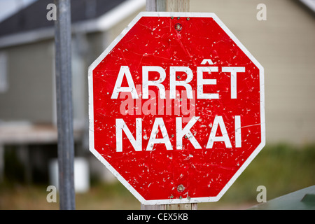 Stop sign in Innu language. Quebec, Canada Stock Photo - Alamy