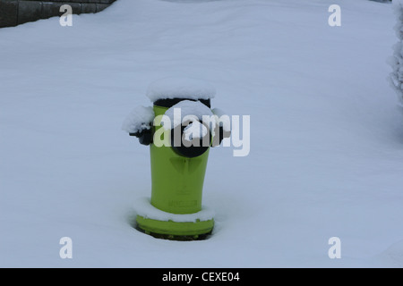Winter scenes from Calgary, Alberta, Canada. Pedestrian sign and snow ...