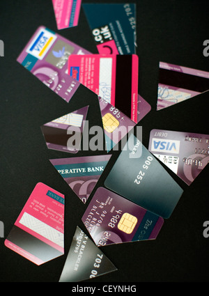 Bank debit card cut into pieces Stock Photo - Alamy
