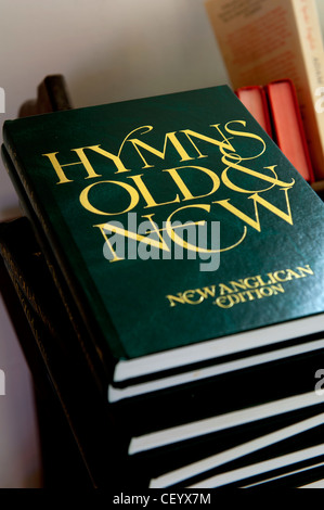 Stack of hymn books in a church Stock Photo - Alamy