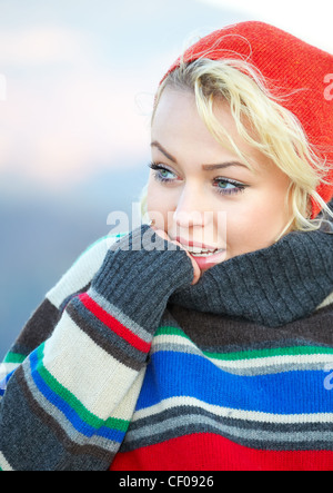 Beautiful blonde twenty year old girl, standing side on to show her trim stomach Stock Photo - Alamy