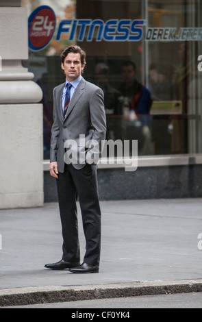 'White Collar' actor Matt Bomer poses on the top of the Empire State ...