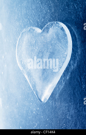 Heart shaped piece of ice Stock Photo - Alamy