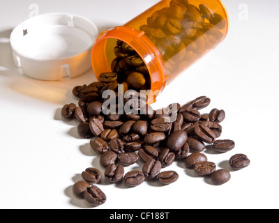 Coffee Beans Spill from Prescription Bottle Stock Photo - Alamy