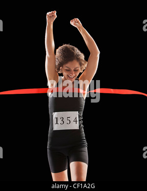 african american woman running across the bridge Stock Photo - Alamy