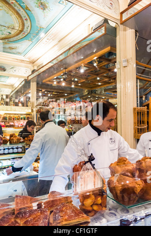 France, Paris, old bakery with breads and decorated with ceramics ...