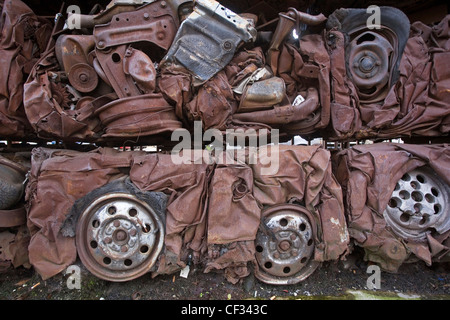 Scrap cars crushed into cubes Stock Photo - Alamy
