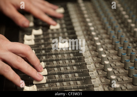 old dirty sound mixer pult. crossfaders and regulators Stock Photo - Alamy
