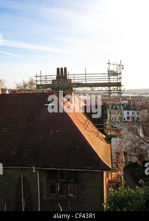 Scaffolding erected for maintenance of roof and chimney stack Stock ...