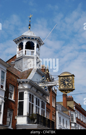 A clock projecting from the Guildford Guildhall. The clock was ...