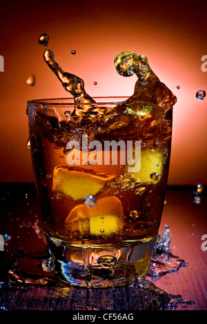 alcoholic beverage whith ice cubes Stock Photo - Alamy