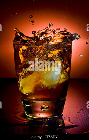 alcoholic beverage whith ice cubes Stock Photo - Alamy