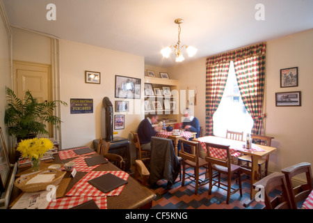 Traditional English Breakfast table laid out by window room interior ...