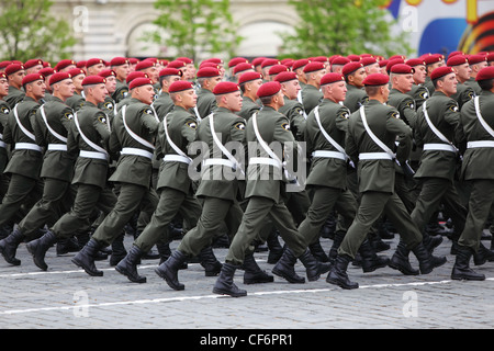 The Russian army in red berets and green uniforms. Military with ...