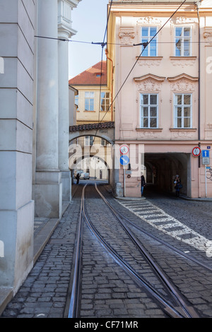 Tram, tramlines and arch in Lesser Town, Prague Stock Photo - Alamy