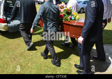 Bearers are carrying a coffin to a cemetery Stock Photo: 51791805 - Alamy