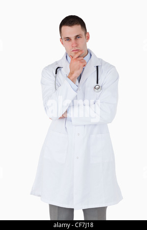 Young doctor thinking Stock Photo - Alamy