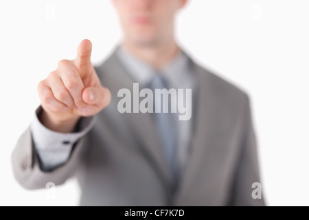 A businessman's hand touching something Stock Photo - Alamy