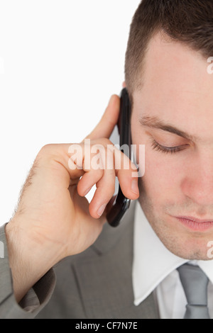Close up of a tired businessman making a phone call Stock Photo - Alamy