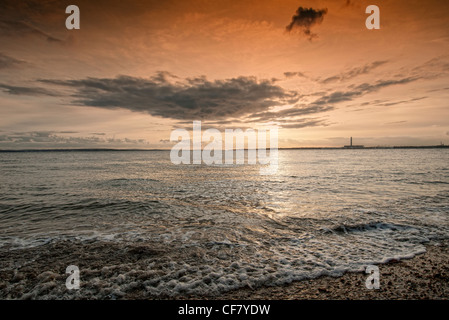 Sun setting over The Solent and the Isle of Wight's famous landmark ...