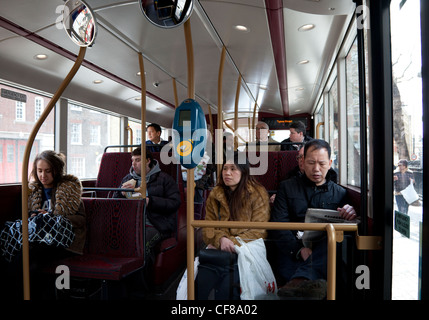 The lower deck inside a London Transport Routemaster bus in the London ...