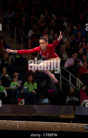 Victoria Moors (CAN) competes in the balance beam event at the 2012 ...