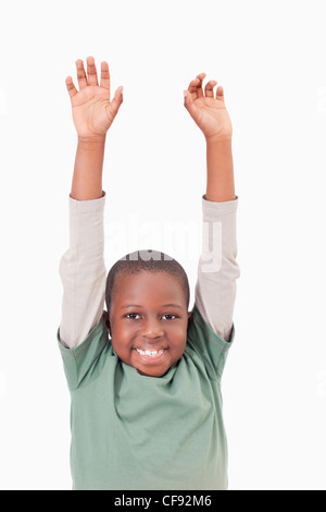 Happy child raising the arms isolated on a white background Stock Photo ...