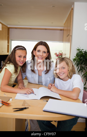 A Girl Getting Help With Her Homework From Her Father Stock Photo - Alamy