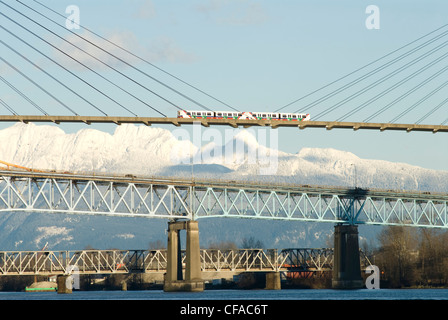 Skytrain bridge over the Fraser River New Westminster British Columbia ...