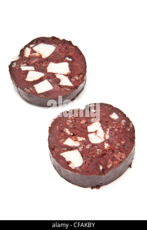 Black pudding or blood sausage sliced and uncooked on a white studio ...