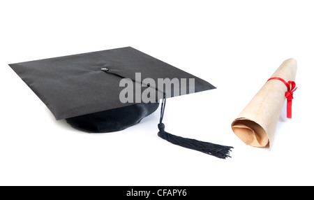 Academic cap and graduation diploma scroll and tied with red ribbon on ...