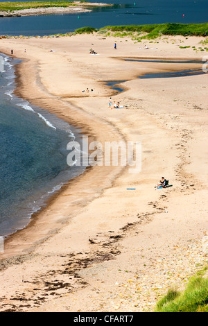 Families enjoying the beach in the coastal and seaside town of Cromer ...